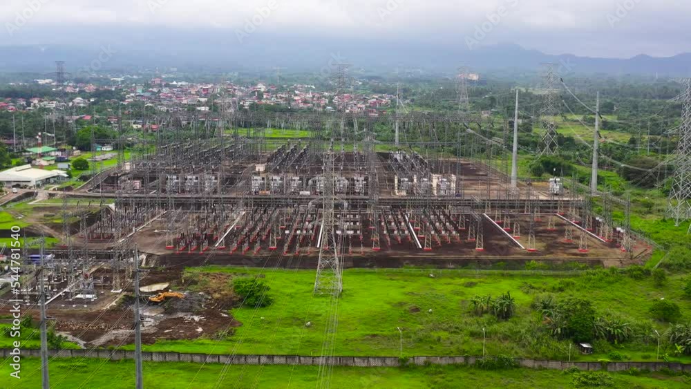 Electrical distribution substation. Distributing high voltage power ...
