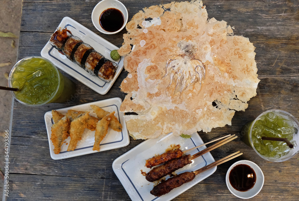 Izakaya(Japanese style street food) Chicken teriyaki skewers, Battered ...