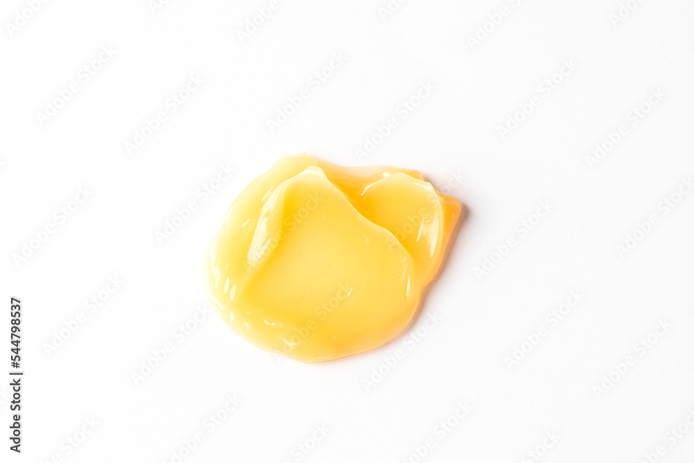 Yellow gel serum swatch texture on white background. Cleanser swatch ...