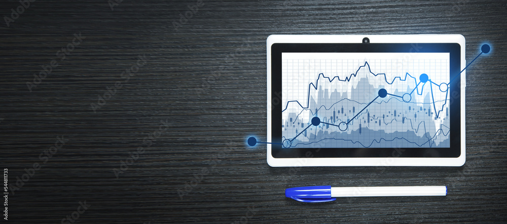 Digital tablet with a growth graph in screen. Stock Photo | Adobe Stock