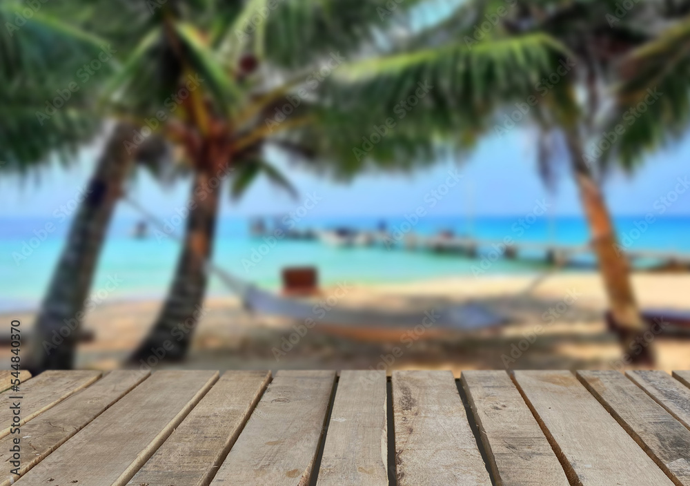 Wooden table top on the coconut tree beach or sea.Party on the beach ...