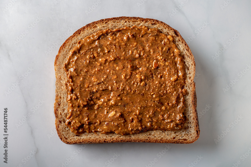 Open sandwich from wholegrain bread with nut crunchy almond butter ...