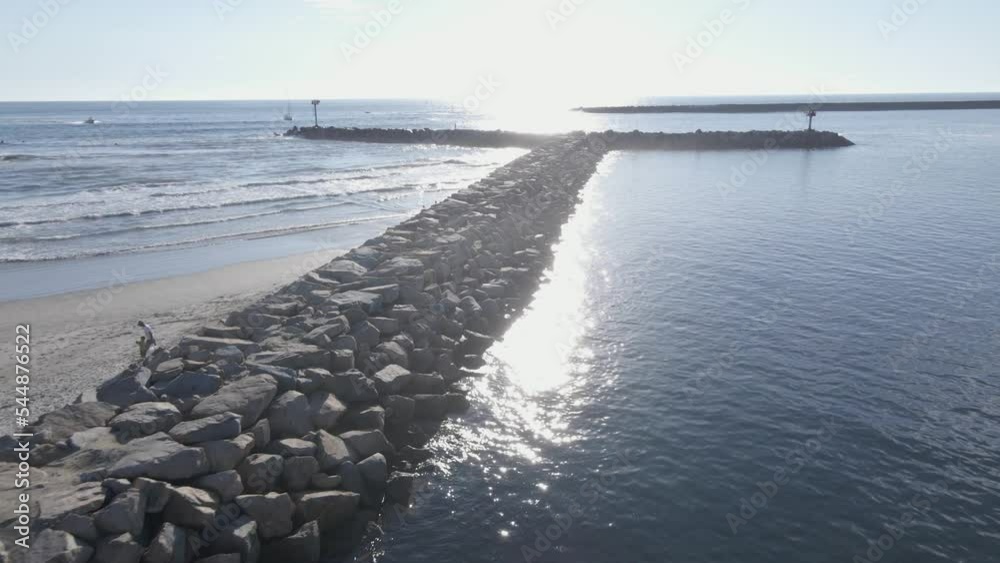 Aerial view of Oceanside north jetty at sunset Stock Video | Adobe Stock