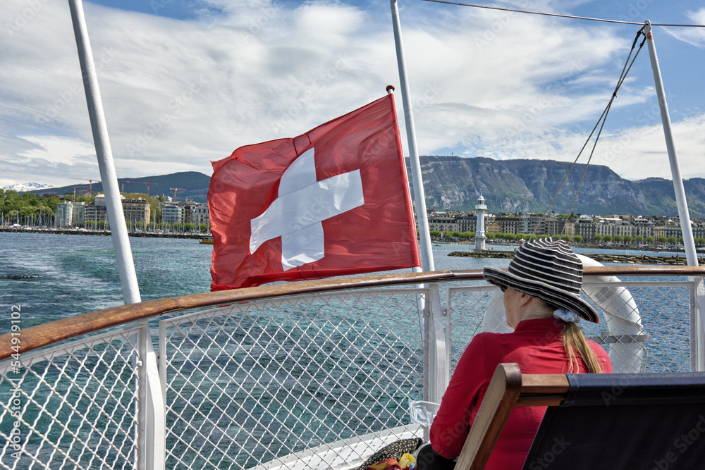 Photo & Art Print Swiss flag at the stern of a steamer cruising on Lake ...