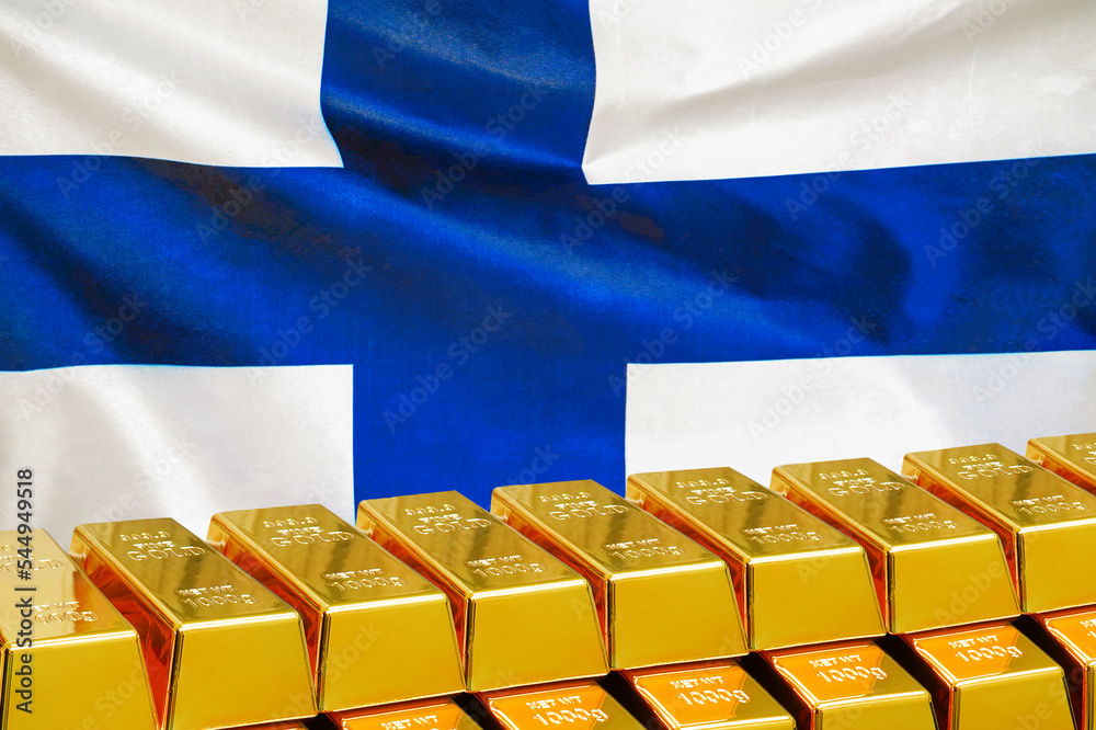 Row of shining golden bullions on the Finland flag background. Business ...