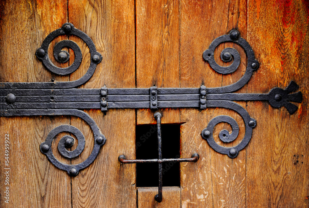 vintage weathered oak door decorative black wrought iron mounting ...