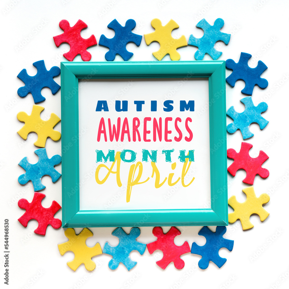 Text World Autism Awareness Month, April, frame with puzzle pieces ...