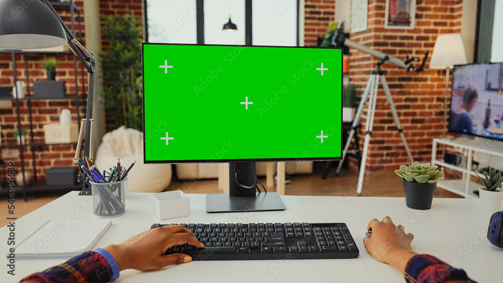 Office worker analyzing isolated greenscreen on computer to work with ...