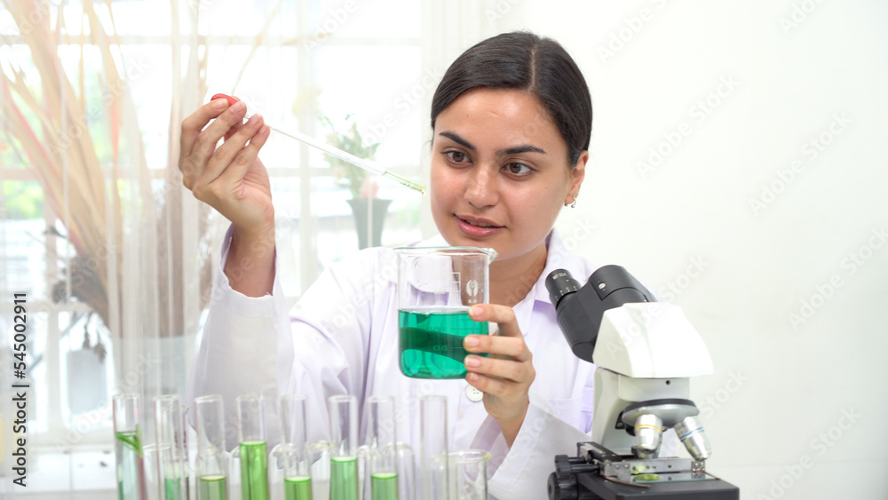 Biologist asian young woman wear lab-coats examining specialist test ...