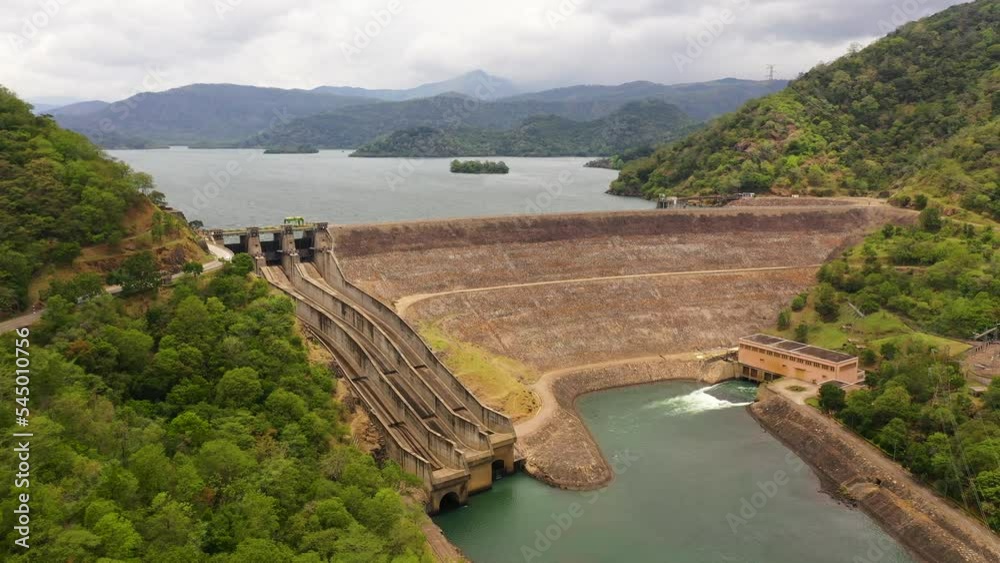Dam on a reservoir and Randenigala hydro power plant in the mountains ...