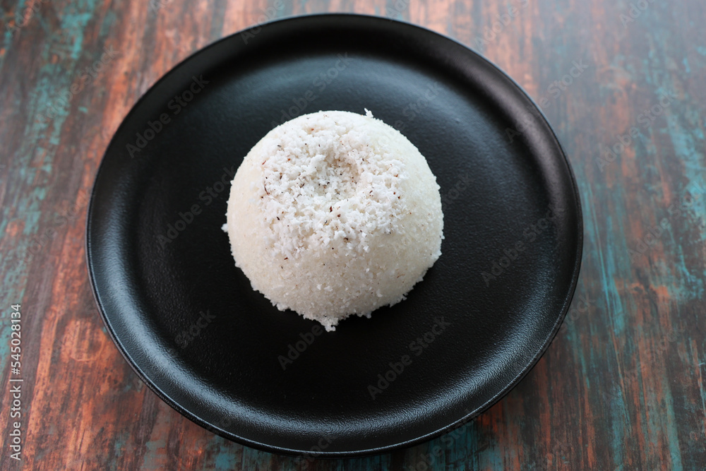 Rice Puttu or pittu steamed rice cake and egg roast curry popular in ...