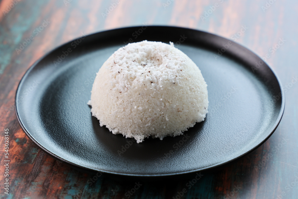 Rice Puttu or pittu steamed rice cake and egg roast curry popular in ...