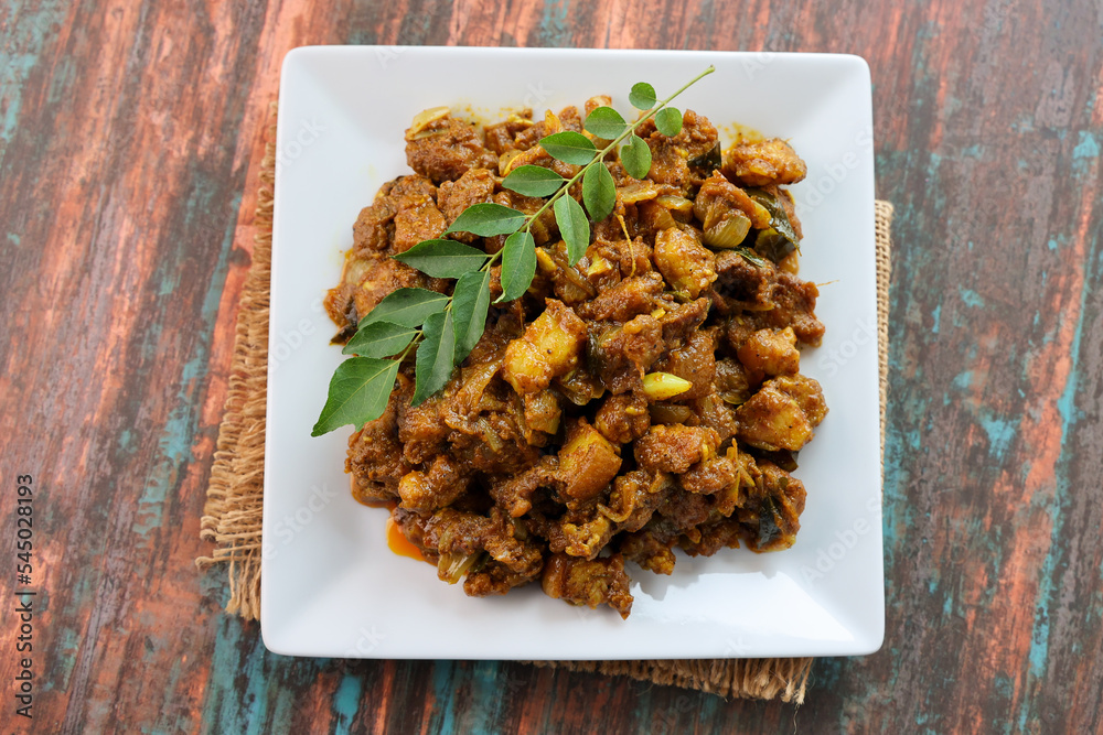 Spicy hot meat curry from Kerala India. Pork pig masala curry vindaloo ...