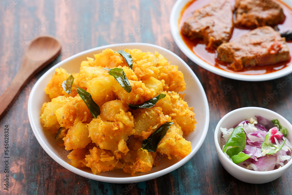 tapioca and spicy hot Kerala fish curry Indian food. Kappa king fish ...