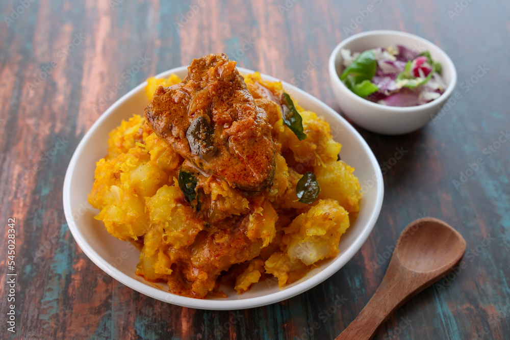 tapioca and spicy hot Kerala fish curry Indian food. Kappa king fish ...