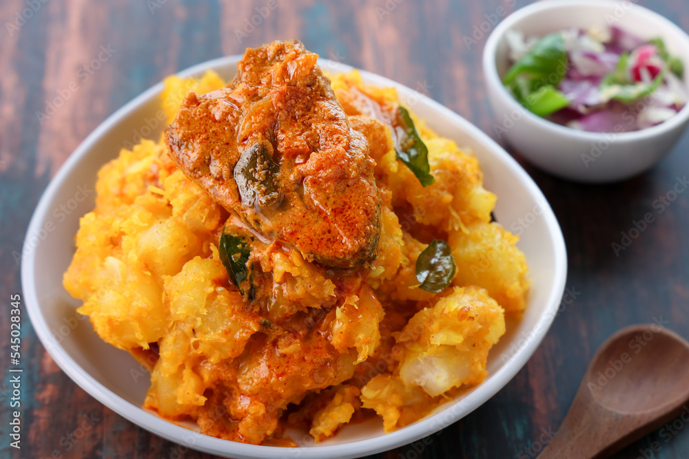 tapioca and spicy hot Kerala fish curry Indian food. Kappa king fish ...