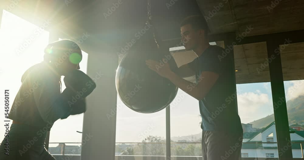 Boxing, woman and personal trainer with fist power, energy and ...