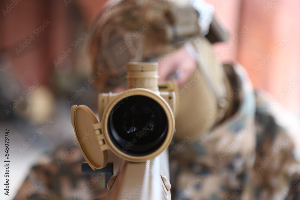 Military man with a weapon aiming through the scope Stock Photo | Adobe ...