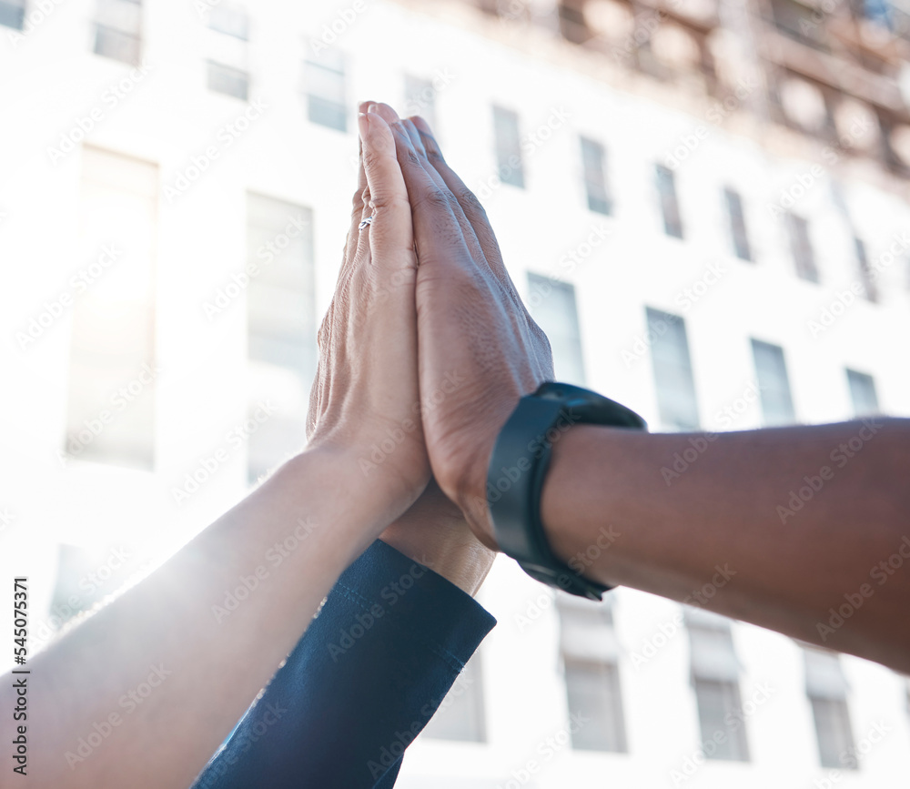 Business people, hands and high five in city for success, community ...