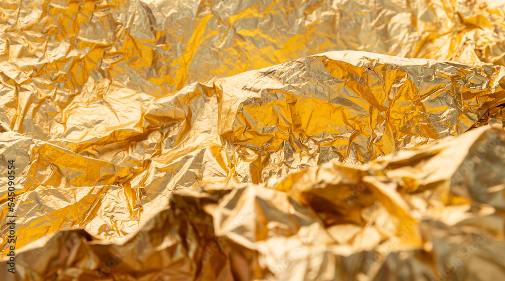 foil yellow. Crumpled gold foil. Stock Photo | Adobe Stock