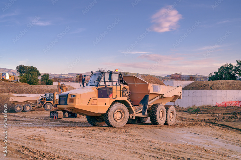 Foto de Viaduct Construction,Articulated dump truck moves filler earth ...