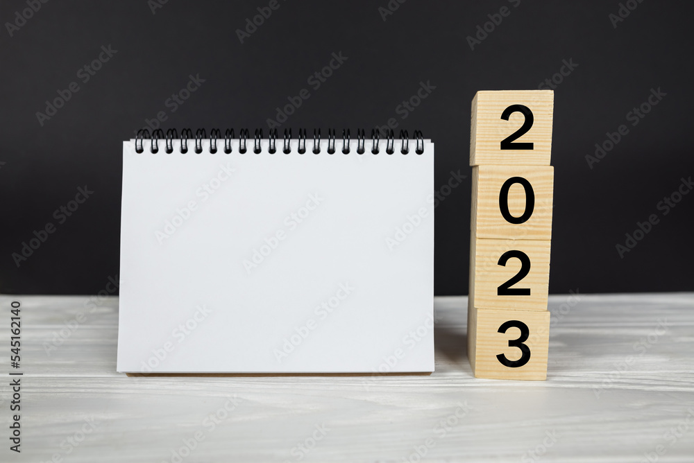 2023 calendar mockup.Text 2023 on wooden cubes. Place for your text in ...