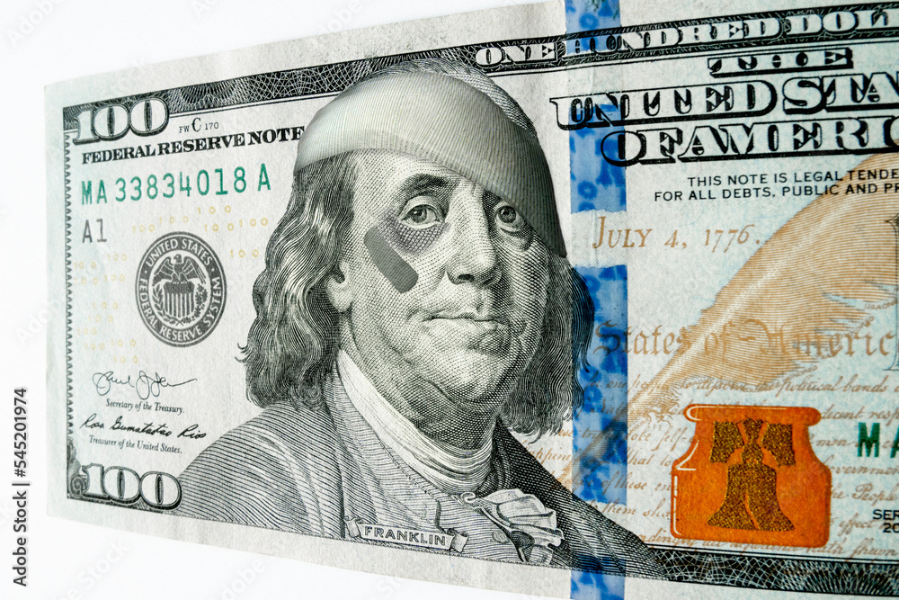 This photo illustration of Ben Franklin with a black eye and bandages ...