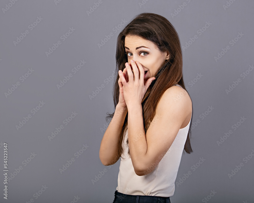 Happy chuckling fun business beautiful woman covering the mouth the ...