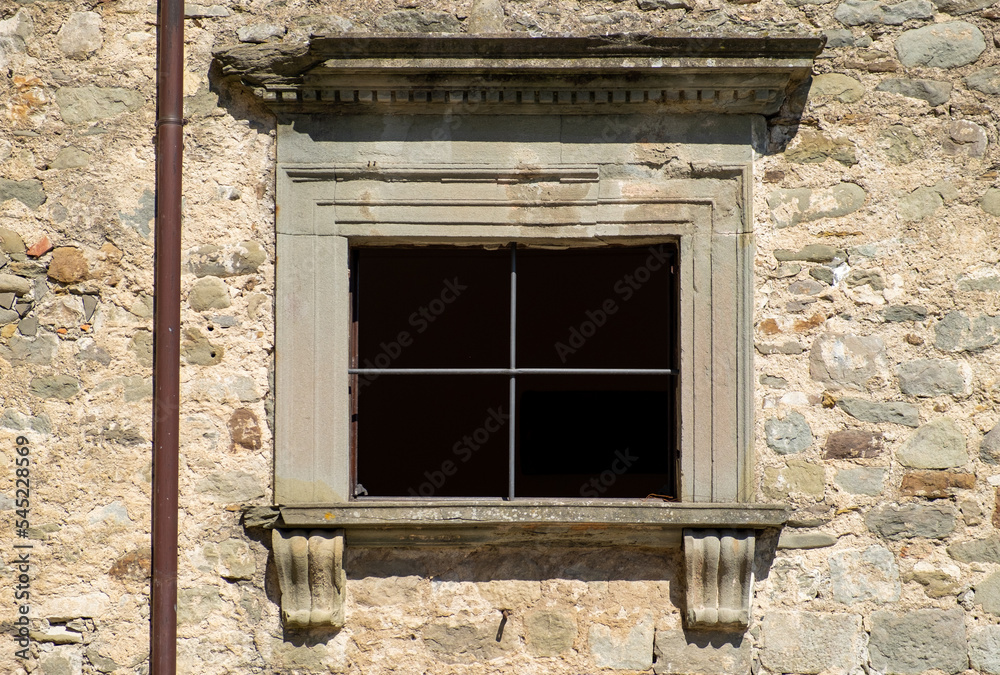 An ancient window with a decaying lintel in Pontremoli. Stock Photo ...