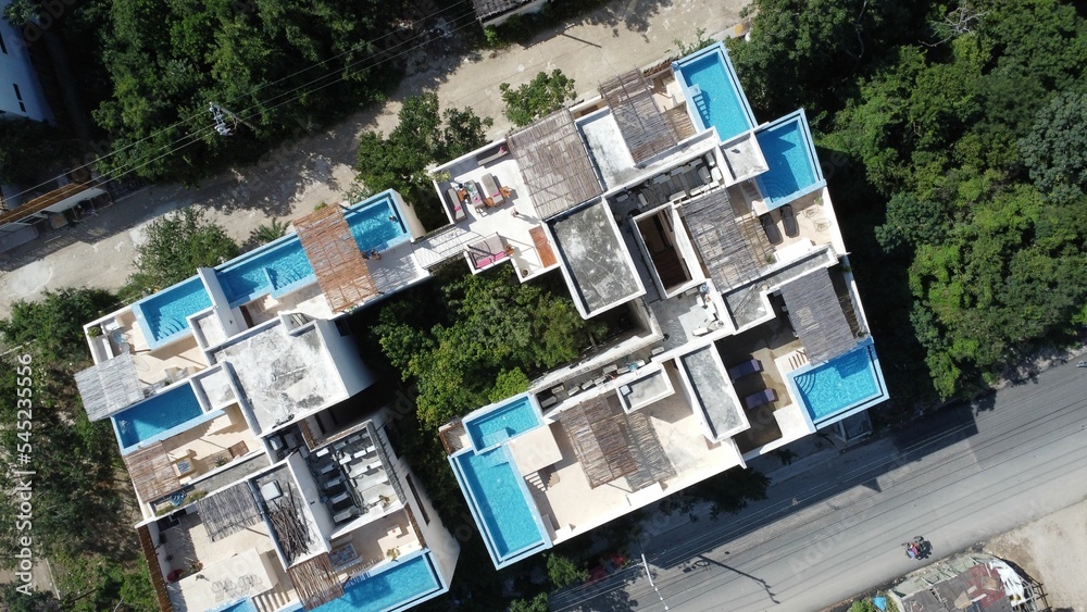 Bird's eye view of a luxury hotel resort with pools on rooftops Stock ...