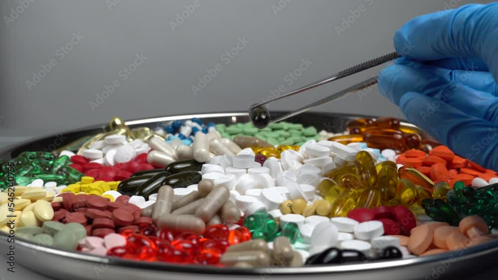 Scientist research pills and tablets medications in the lab. Medical ...