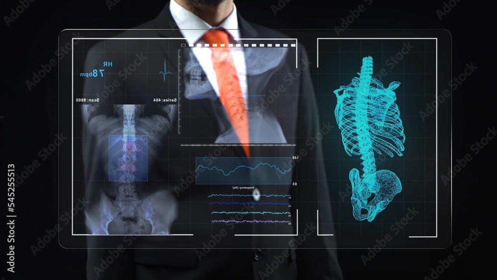 Man in black business suit studying holographic interface with touch ...
