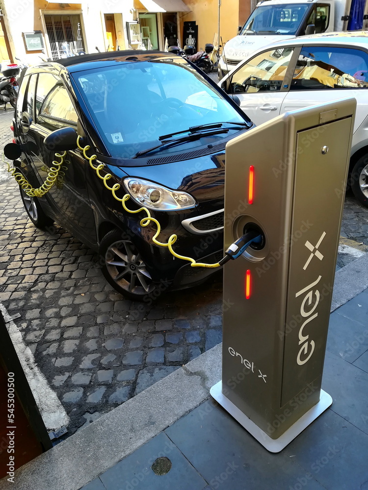 Fotka „Rome, Italy - April 12, 2019: Electric smart charging to an Enel ...