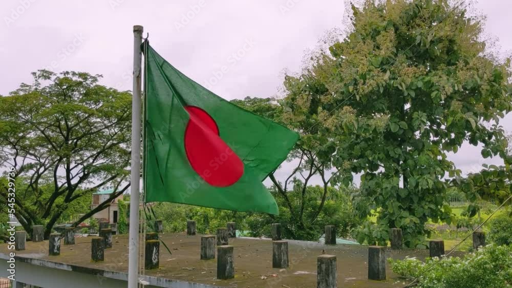 The official flag of Bangladesh is flying in the school playground. The ...
