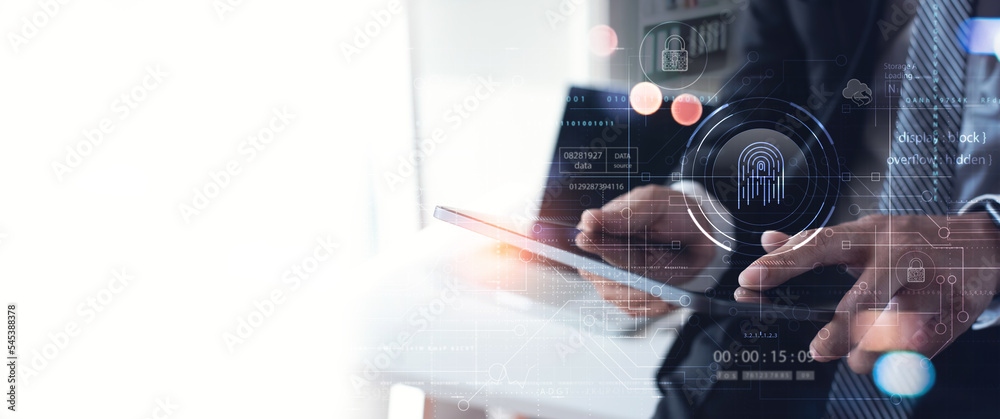 Businessman using tablet and fingerprint scanning to unlock and access ...