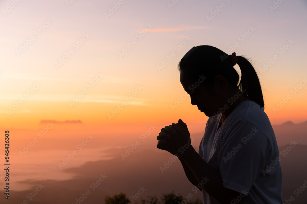 Faith of christian concept: Spiritual prayer hands over sunshine with ...