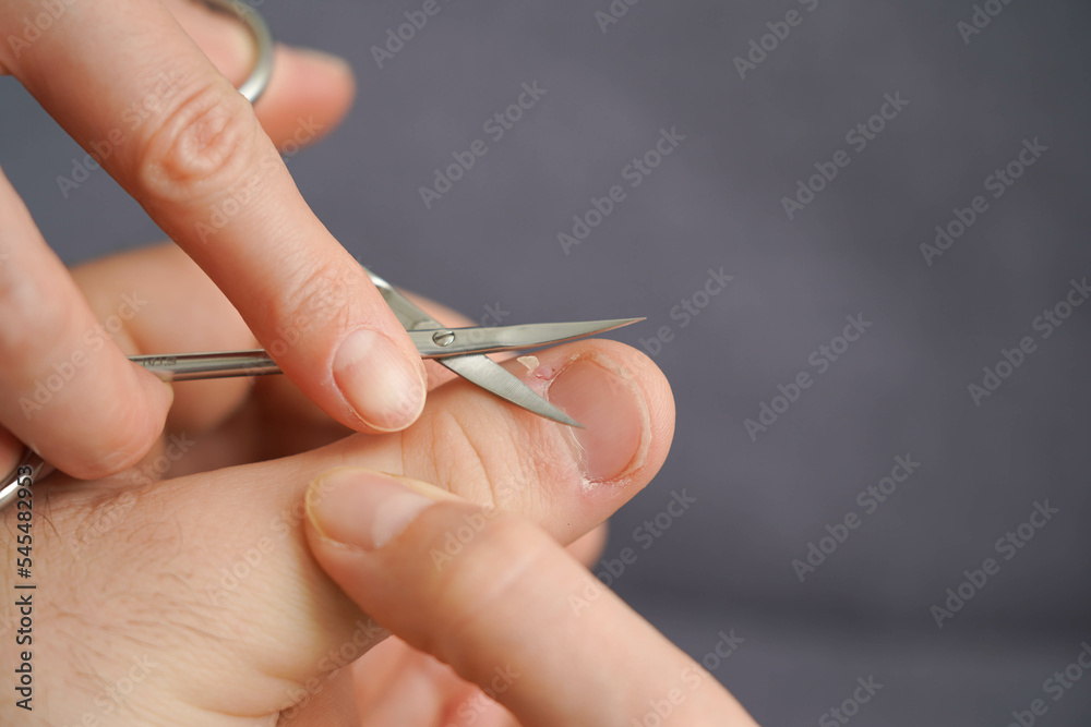 Foto de Men's manicure at home. Cut fingernails. Fingernails close-up ...