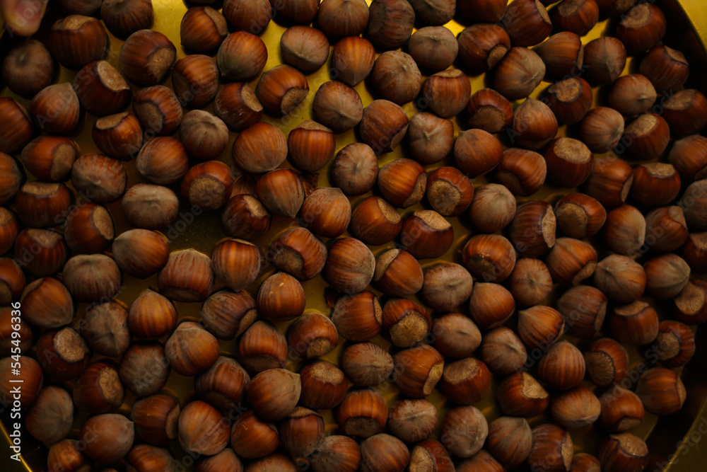 Dark photo, group of raw unshelled hazelnuts, top view Stock Photo ...