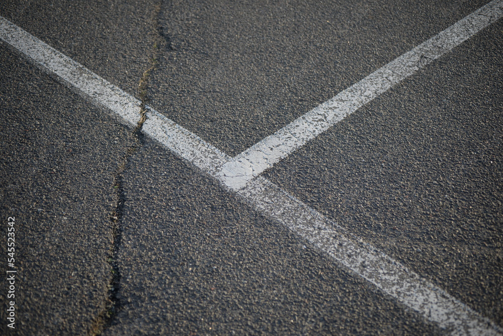 background road markings white stripes on the asphalt road, parking ...
