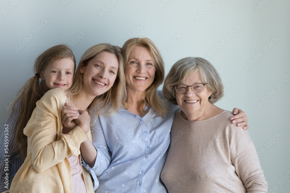 Loving multi-generational family portrait. Different age generation ...