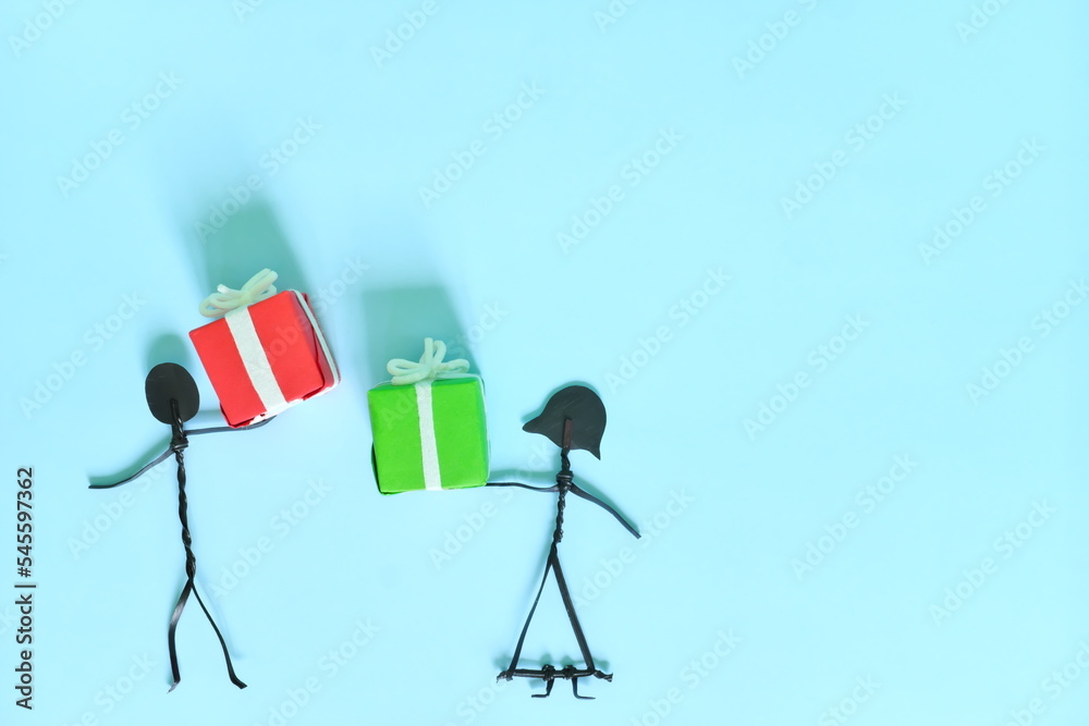 Christmas season or anniversary gift giving and sharing concept. Man ...