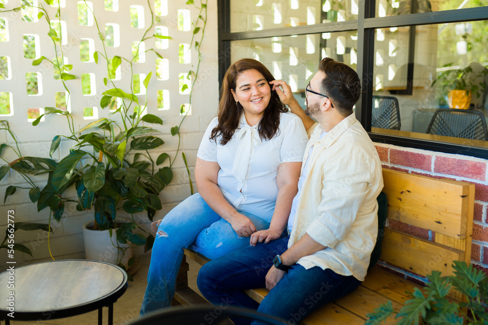 Romantic boyfriend talking with his girlfriend at the coffee shop Stock ...