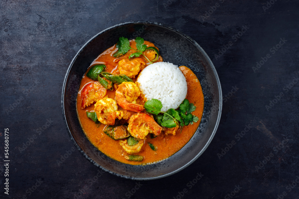Traditional Thai kaeng phet red curry with chili and basmati rice ...