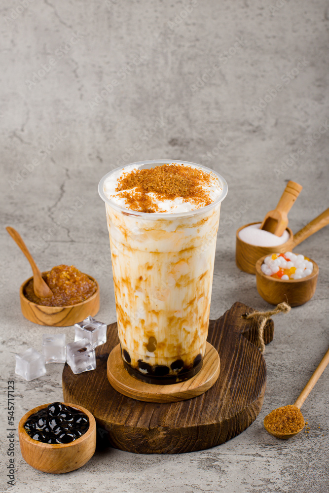 Boba or tapioca pearls is taiwan bubble milk tea in plastic cup with ...