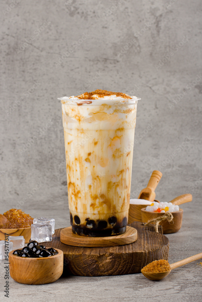 Boba or tapioca pearls is taiwan bubble milk tea in plastic cup with ...