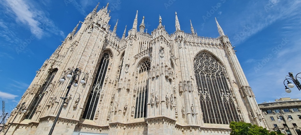 Cathedral Duomo di Milano. Panoramic view of the ornate facade with ...