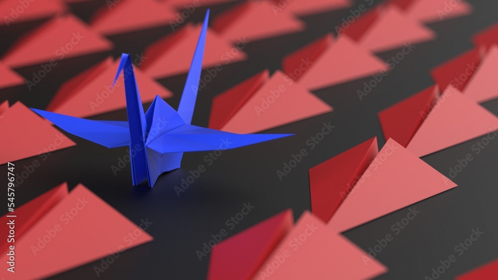 Origami of blue crane and many red airplanes on black board under white ...