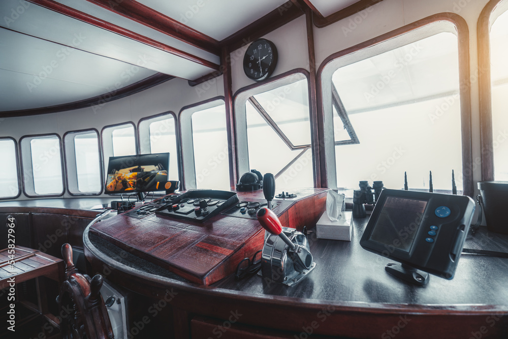A wide-angle perspective view of a vessel dashboard with plenty of ...