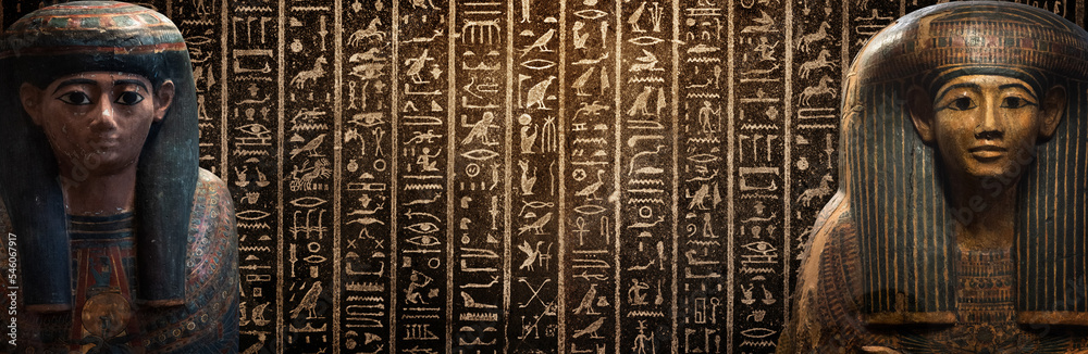 Egyptian mummy on background of ancient Egyptian hieroglyphs. Wide ...