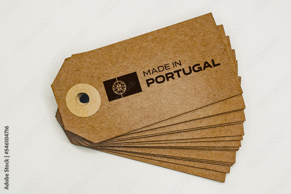 Bunch of cardboard labels with 'Made In Portugal' inscription and flag ...
